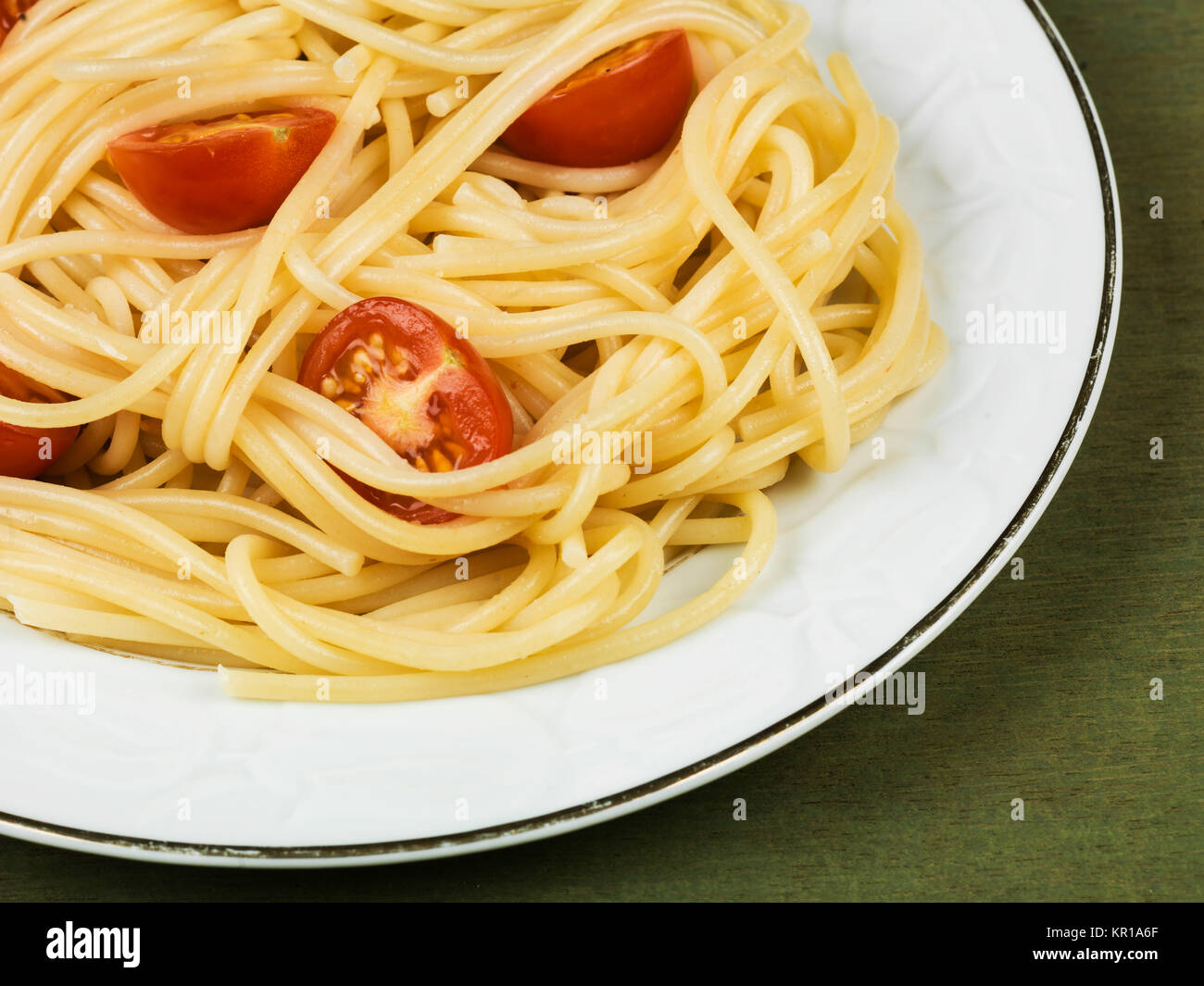 Italian Style Food of Spaghetti with Cherry Tomatoes Stock Photo - Alamy