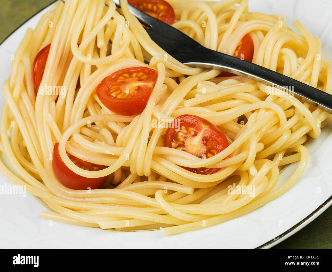 Italian Style Food of Spaghetti with Cherry Tomatoes Stock Photo - Alamy