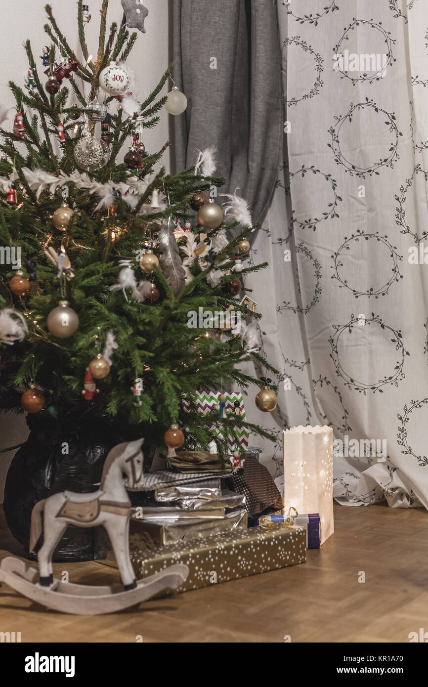 Christmas gifts wrapped under tree hi-res stock photography and images ...