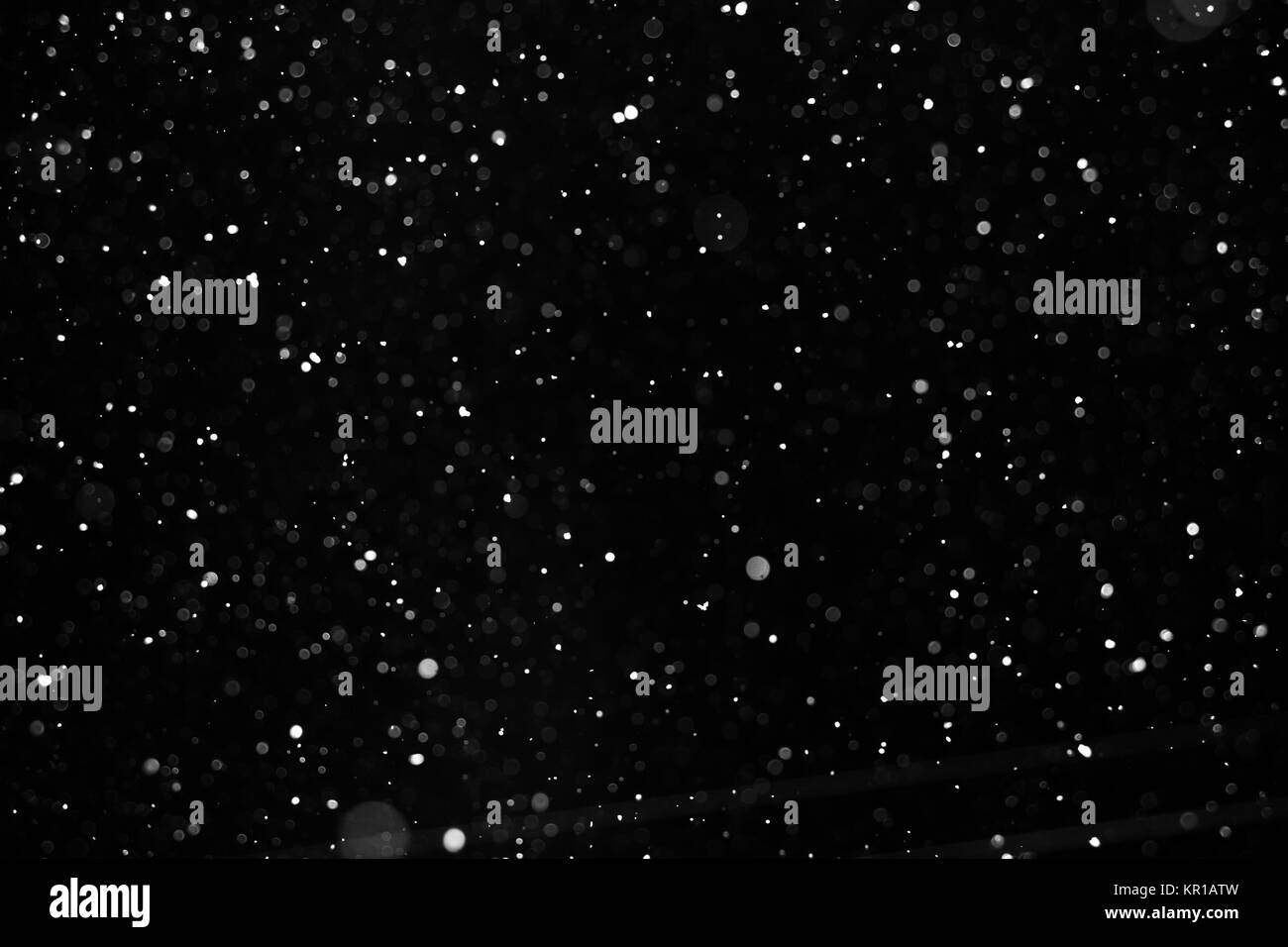 Falling snow on black background. Beautiful winter holiday background ...