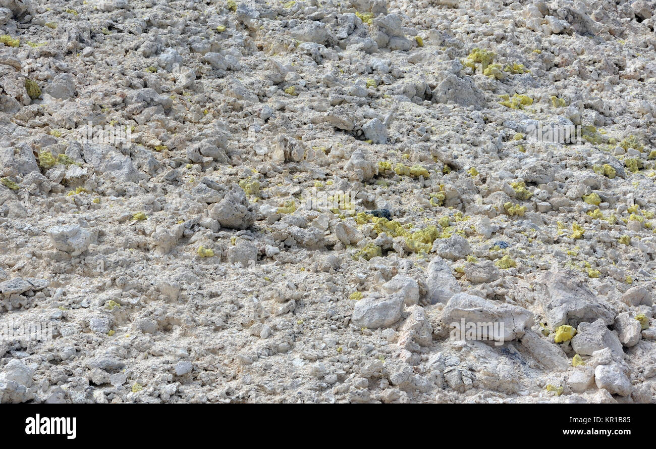 Eroded sulphur minerals below active fumaroles within the caldera of ...