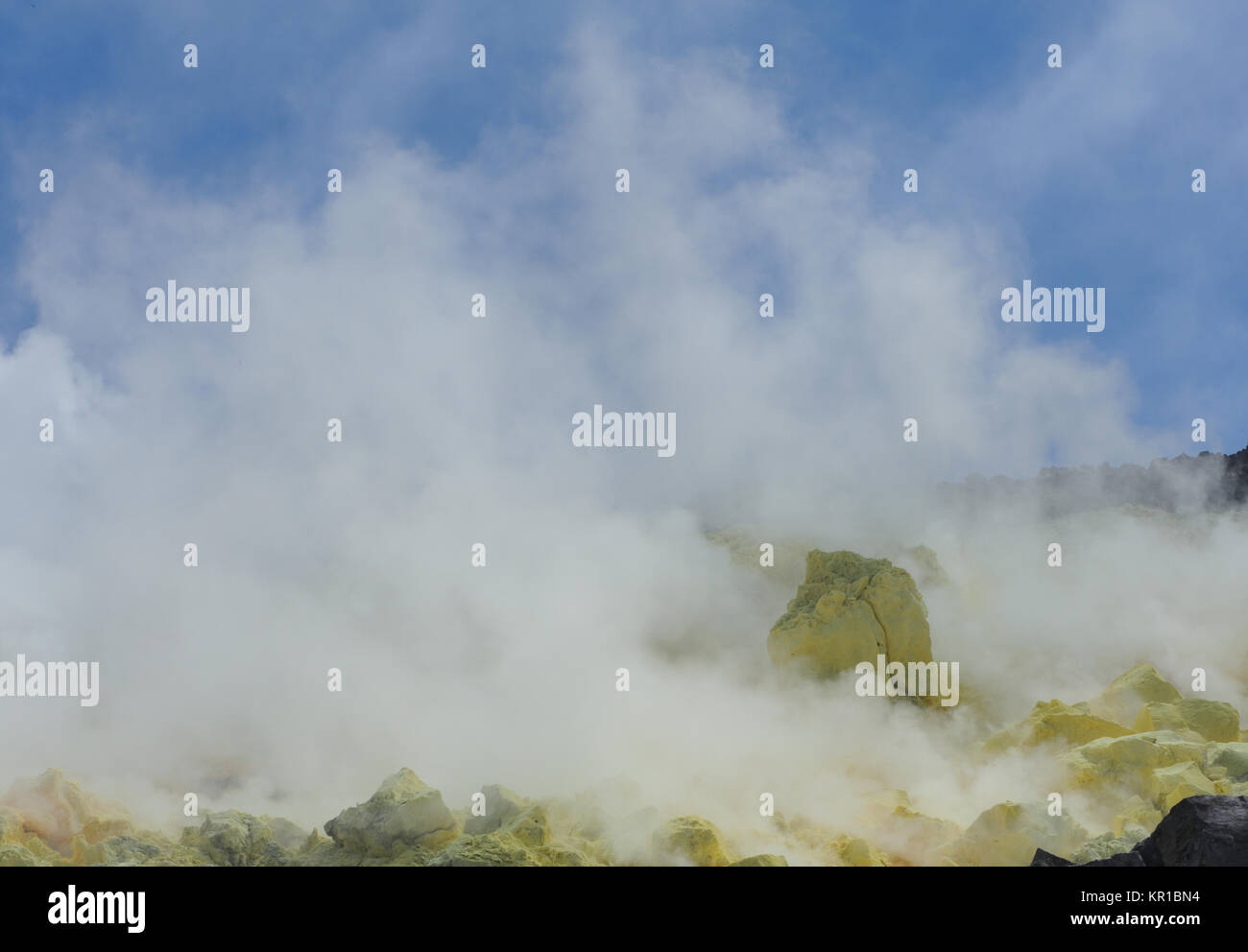 Clouds of sulphuric acid laden steam billow from active fumaroles and ...
