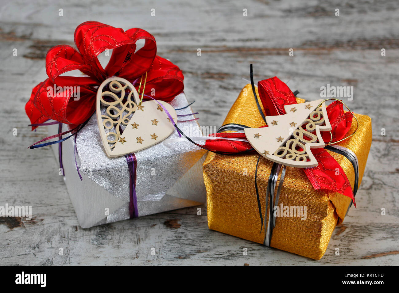 Christmas gift boxes, silver and golden Stock Photo - Alamy