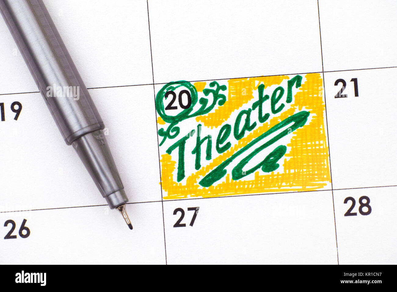 Reminder Theater in calendar with green pen. Close-up Stock Photo - Alamy