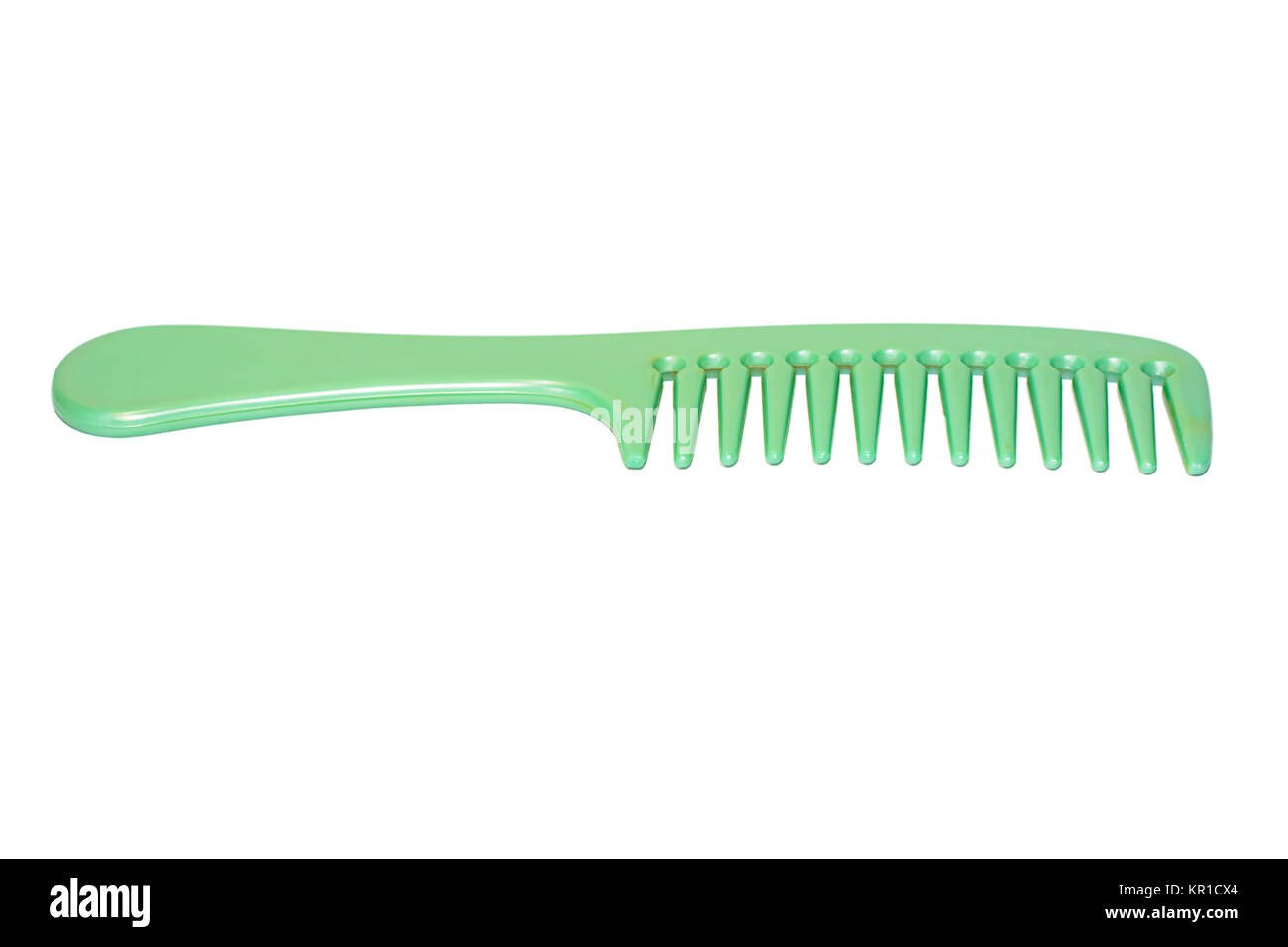 Green hair comb Stock Photo - Alamy
