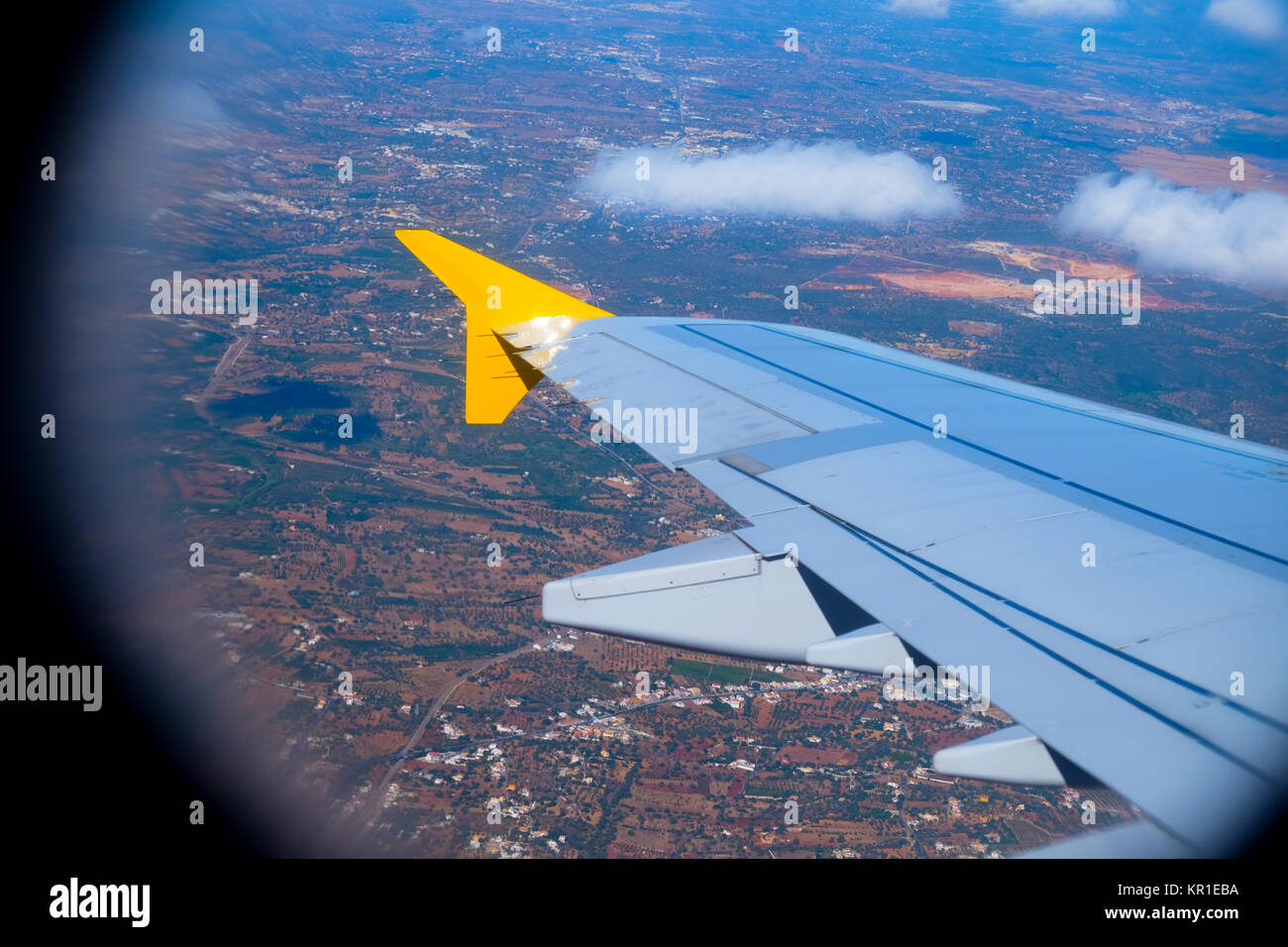 View point from inside and airoplane looking out over the left aircraft ...