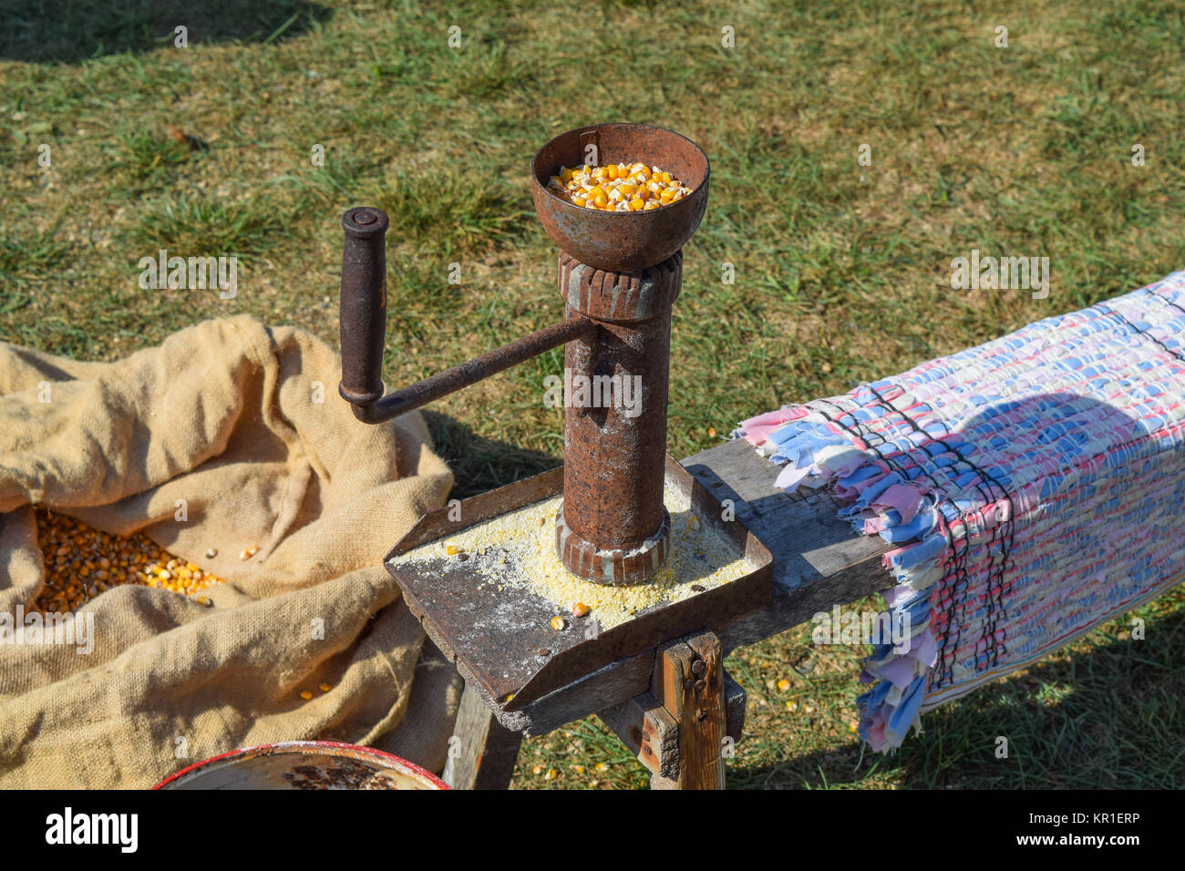 Manual Corncrusher corn grinding Stock Photo - Alamy