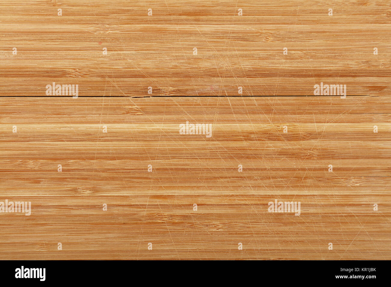 Bamboo wood chopping board background with cuts Stock Photo - Alamy