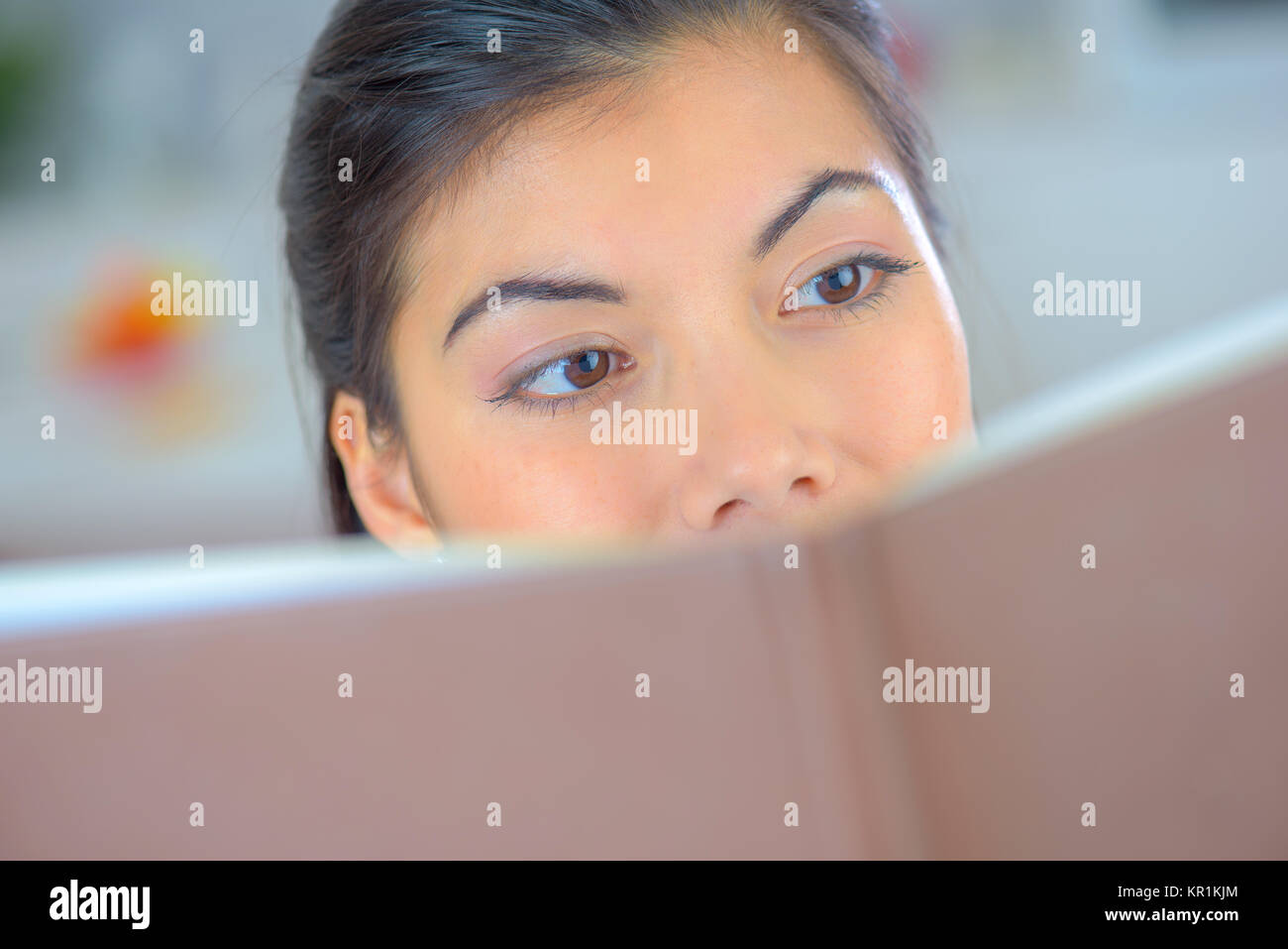 Relaxing by reading a book Stock Photo - Alamy