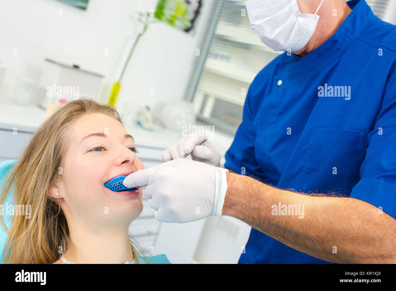 Woman having a routine dental check-up Stock Photo - Alamy