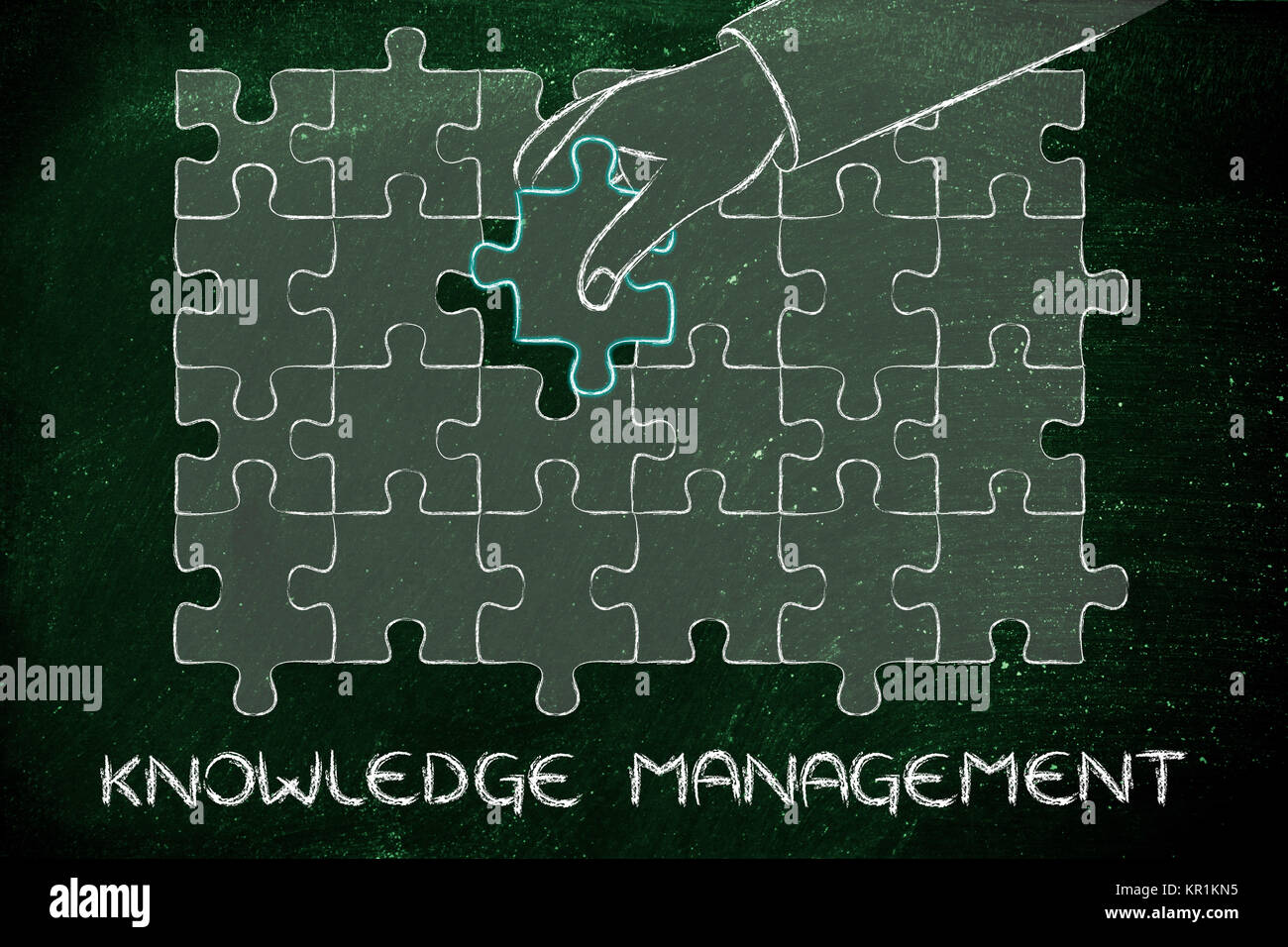 hand completing a puzzle, concept of knowledge management Stock Photo ...
