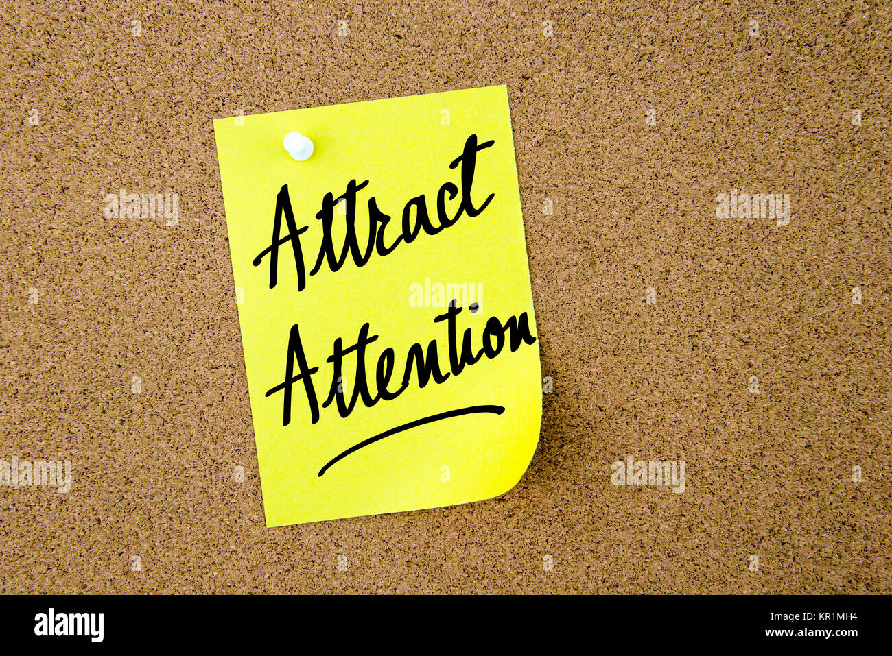 Attract Attention written on yellow paper note Stock Photo - Alamy Attract Attention written on yellow paper note Stock Photo - Alamy