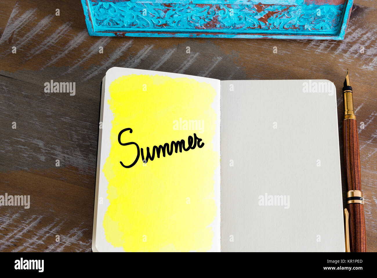 Text Summer handwritten on notebook Stock Photo - Alamy