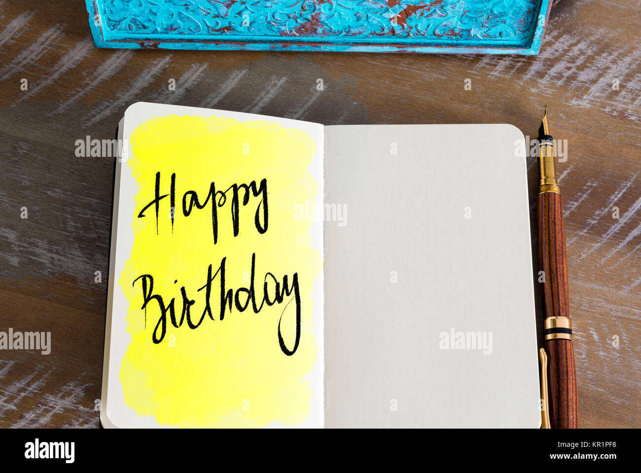 Greeting Happy Birthday handwritten on notebook Stock Photo - Alamy