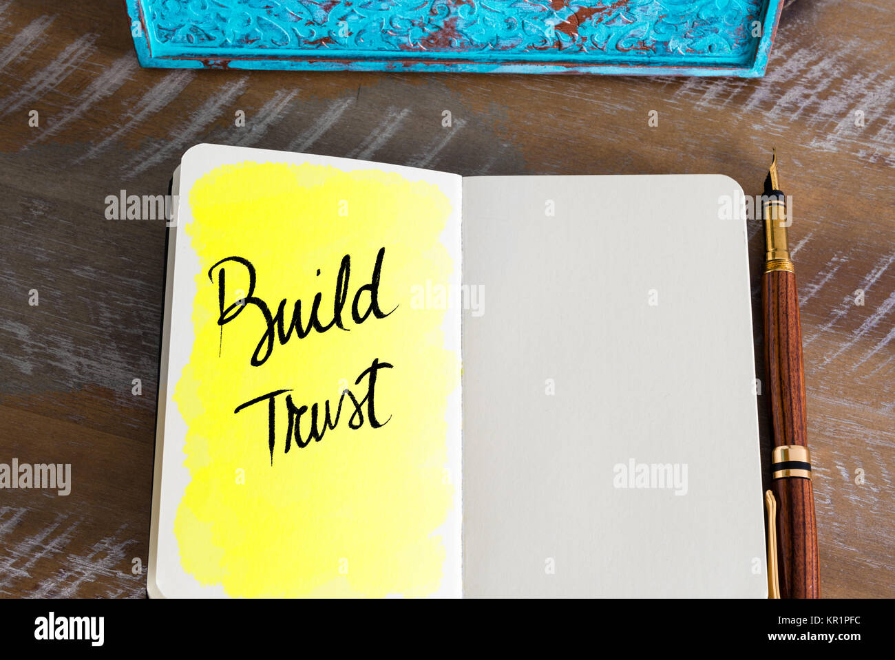 Text Build Trust handwritten on notebook Stock Photo - Alamy