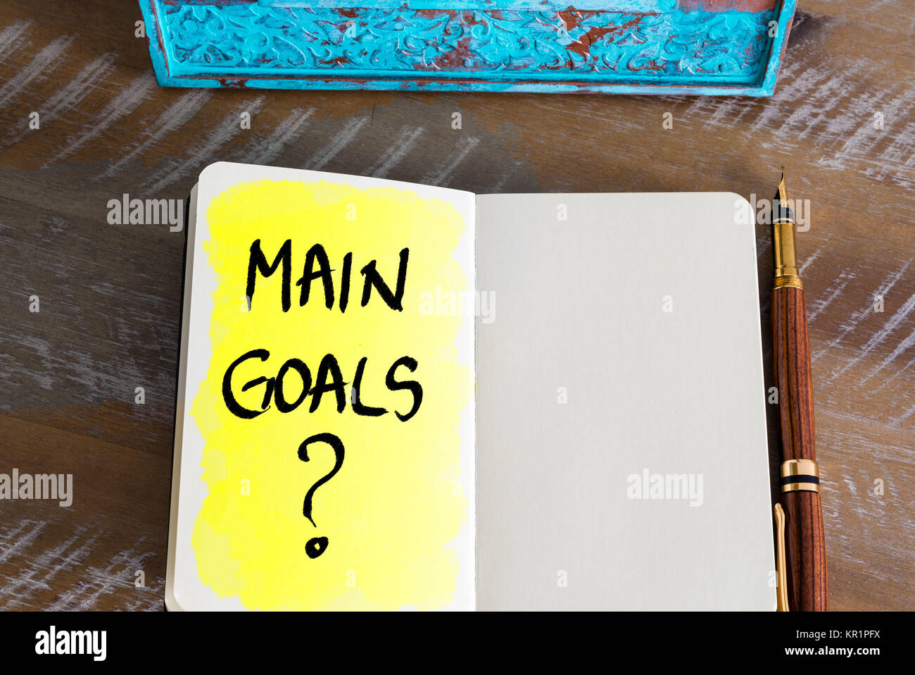 Question Main Goals ? handwritten on notebook Stock Photo - Alamy