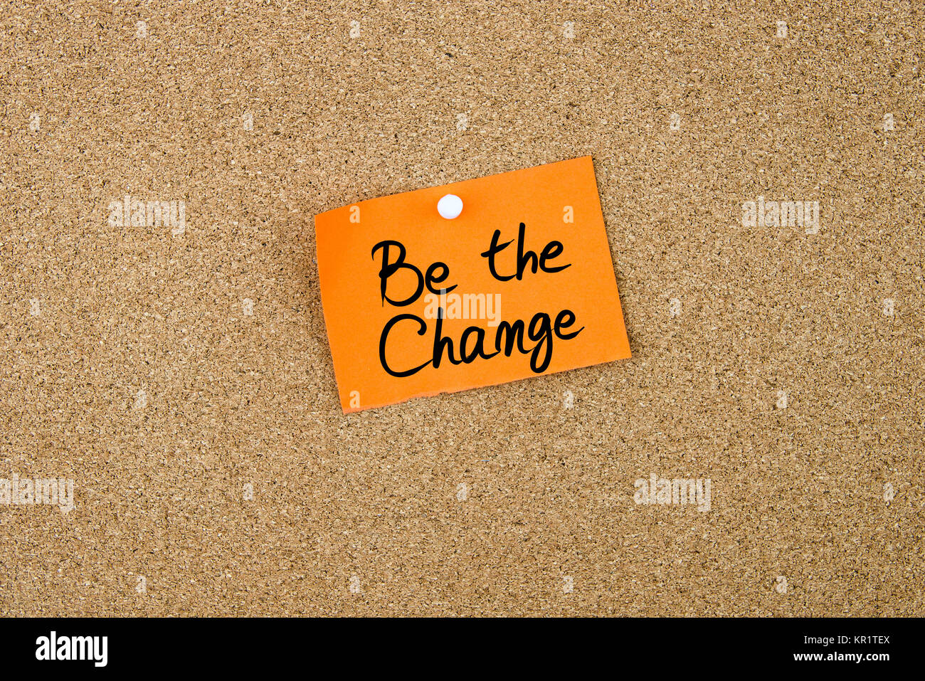 Be The Change written on orange paper note Stock Photo - Alamy