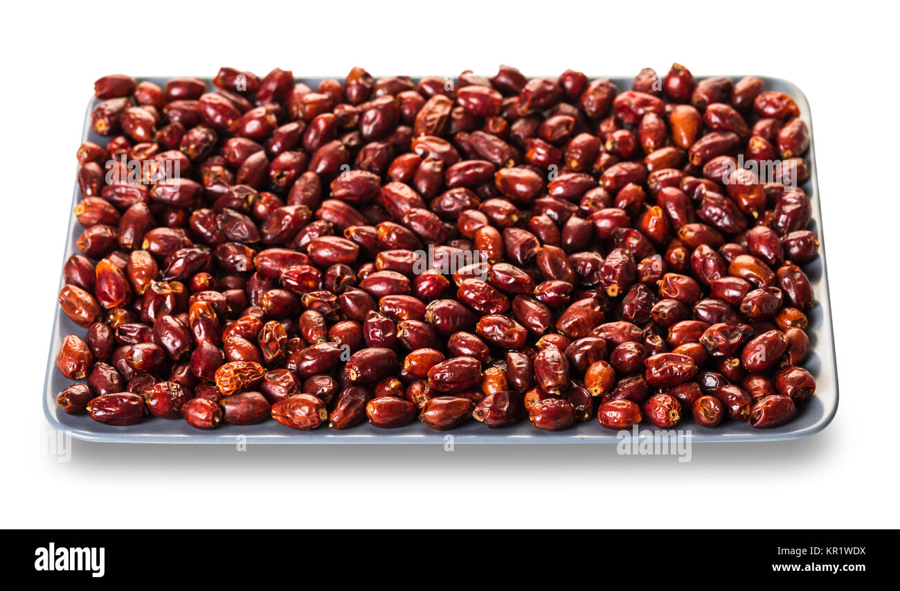 dry briar in a plate on white isolated background Stock Photo - Alamy