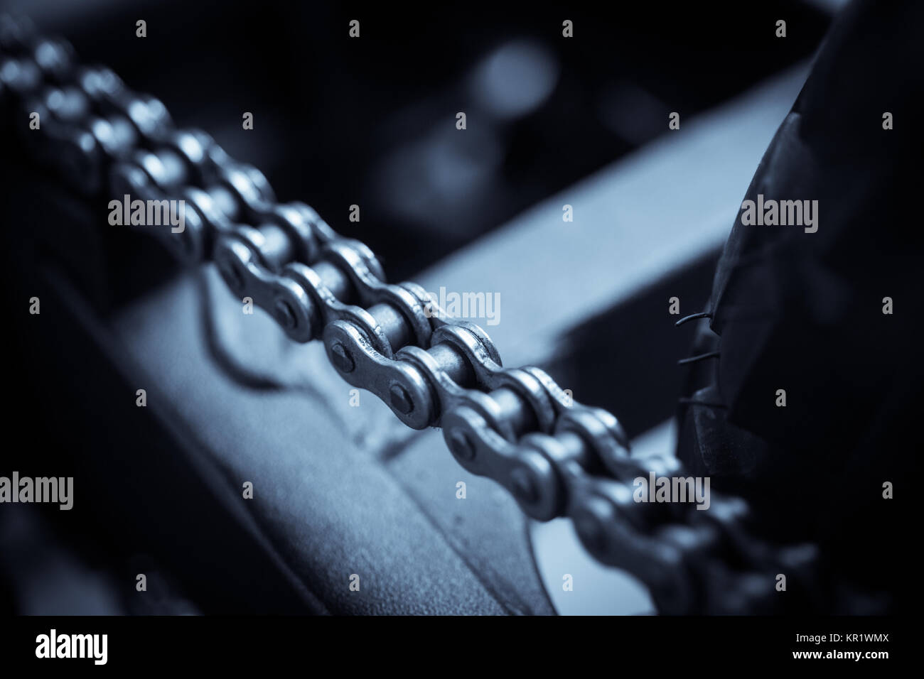 Motorcycle chain detail Stock Photo - Alamy