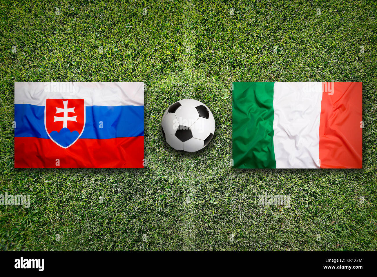 Slovakia vs. Italy flags on soccer field Stock Photo - Alamy