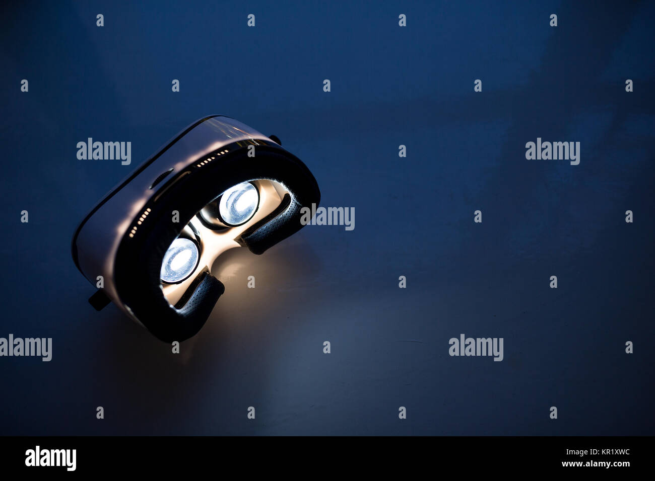 VR virtual reality headset light up inside at night Stock Photo - Alamy
