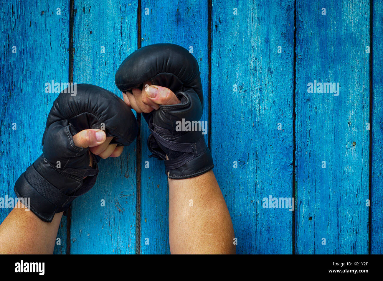 Fingers in blue gloves hi-res stock photography and images - Alamy