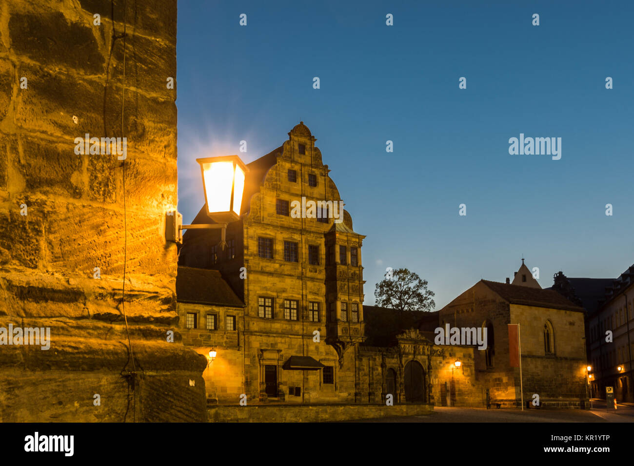 Illumiated historic building at night Stock Photo - Alamy