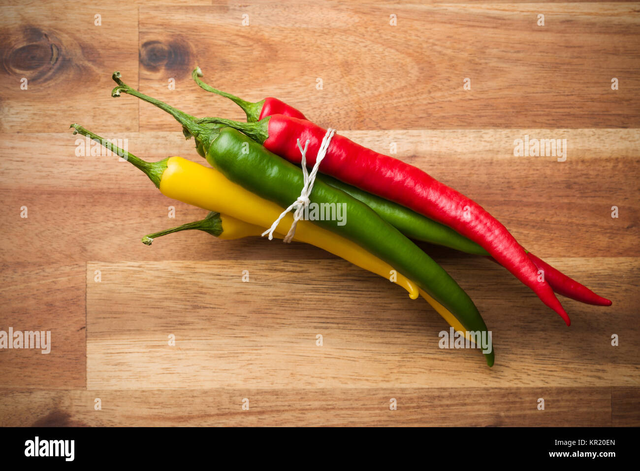 Different colors chilli peppers Stock Photo - Alamy
