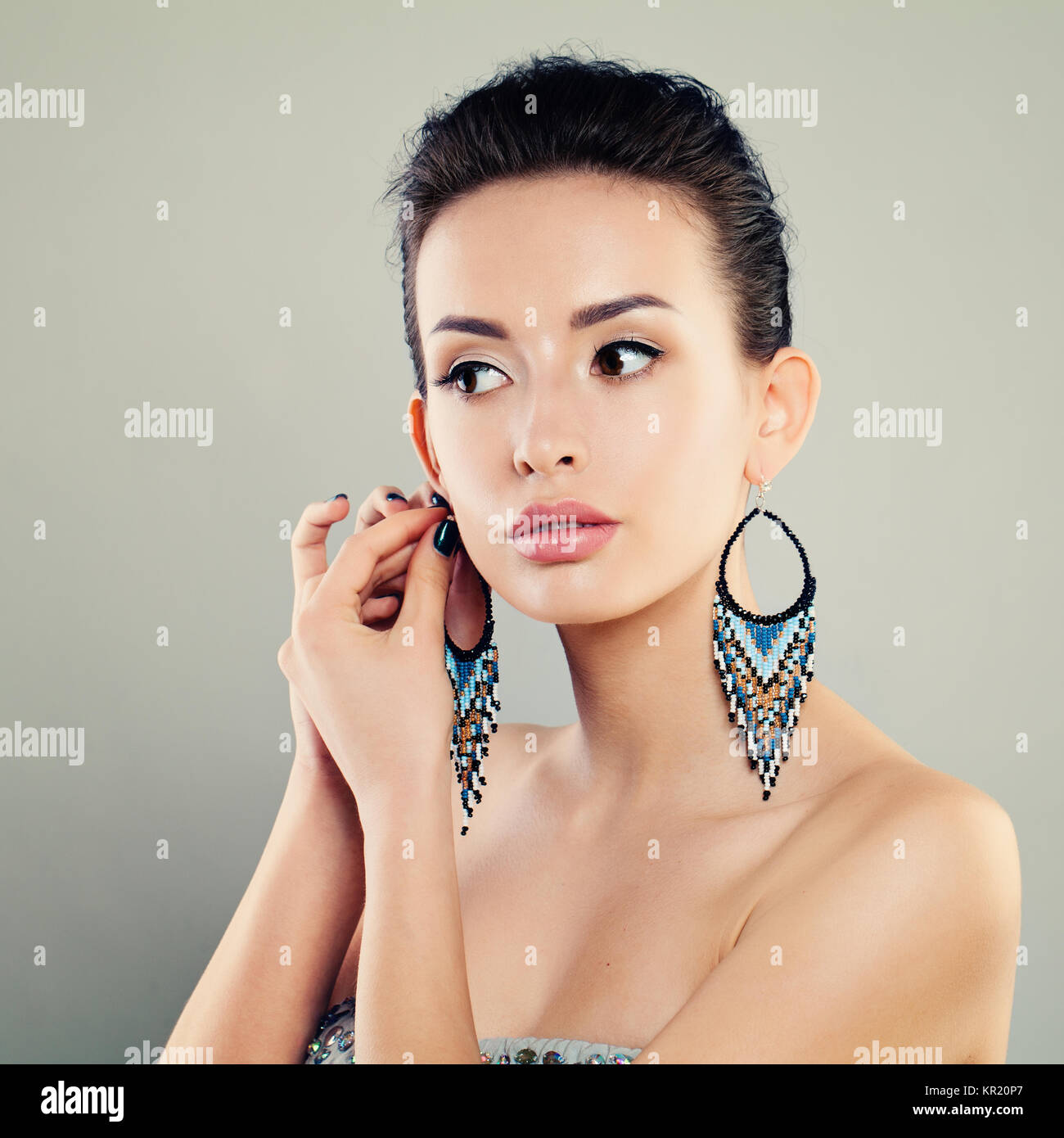Cute Model with Earrings. Cute Young Face Stock Photo - Alamy