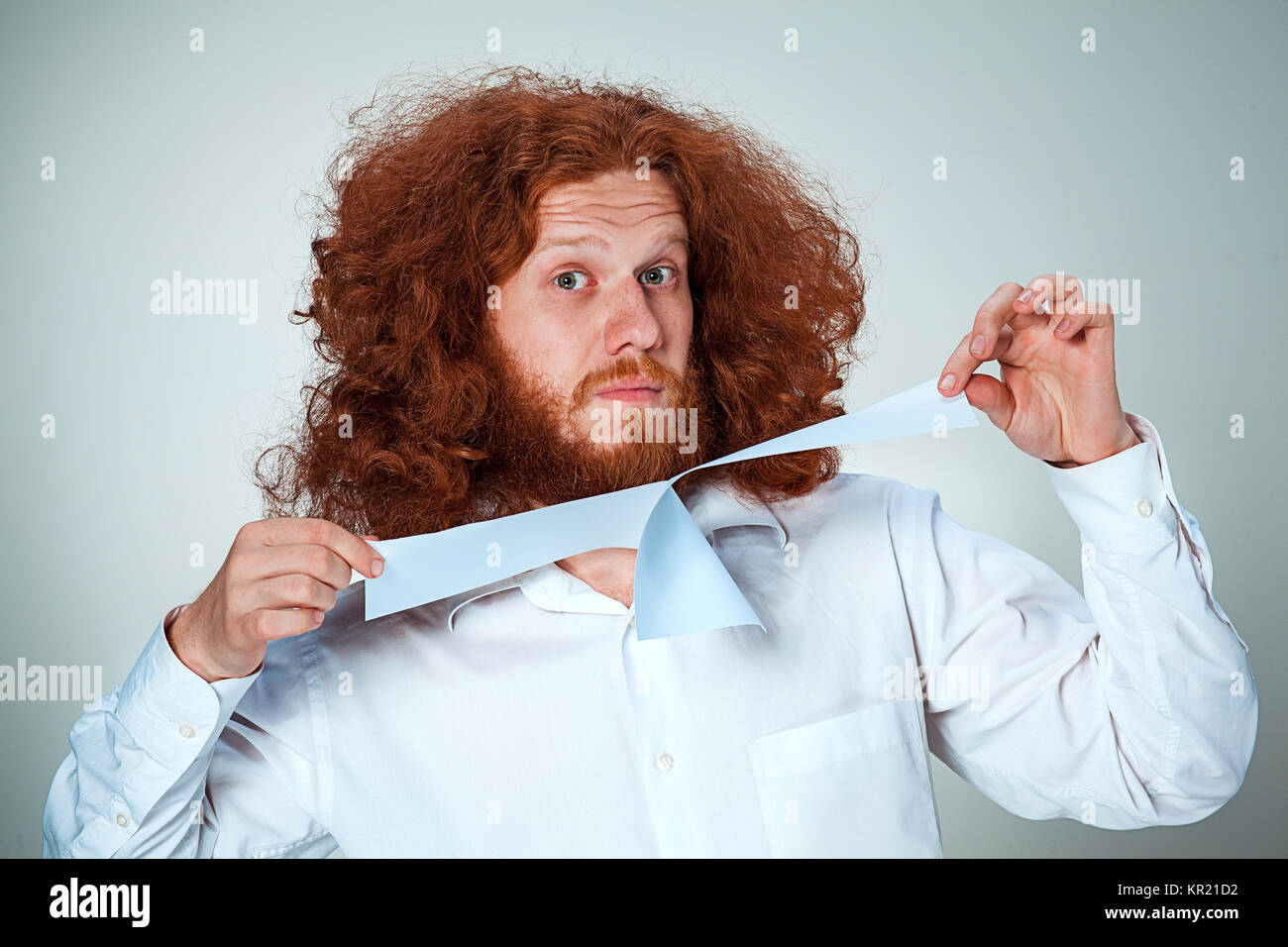 Angry man tear out paper Stock Photo - Alamy