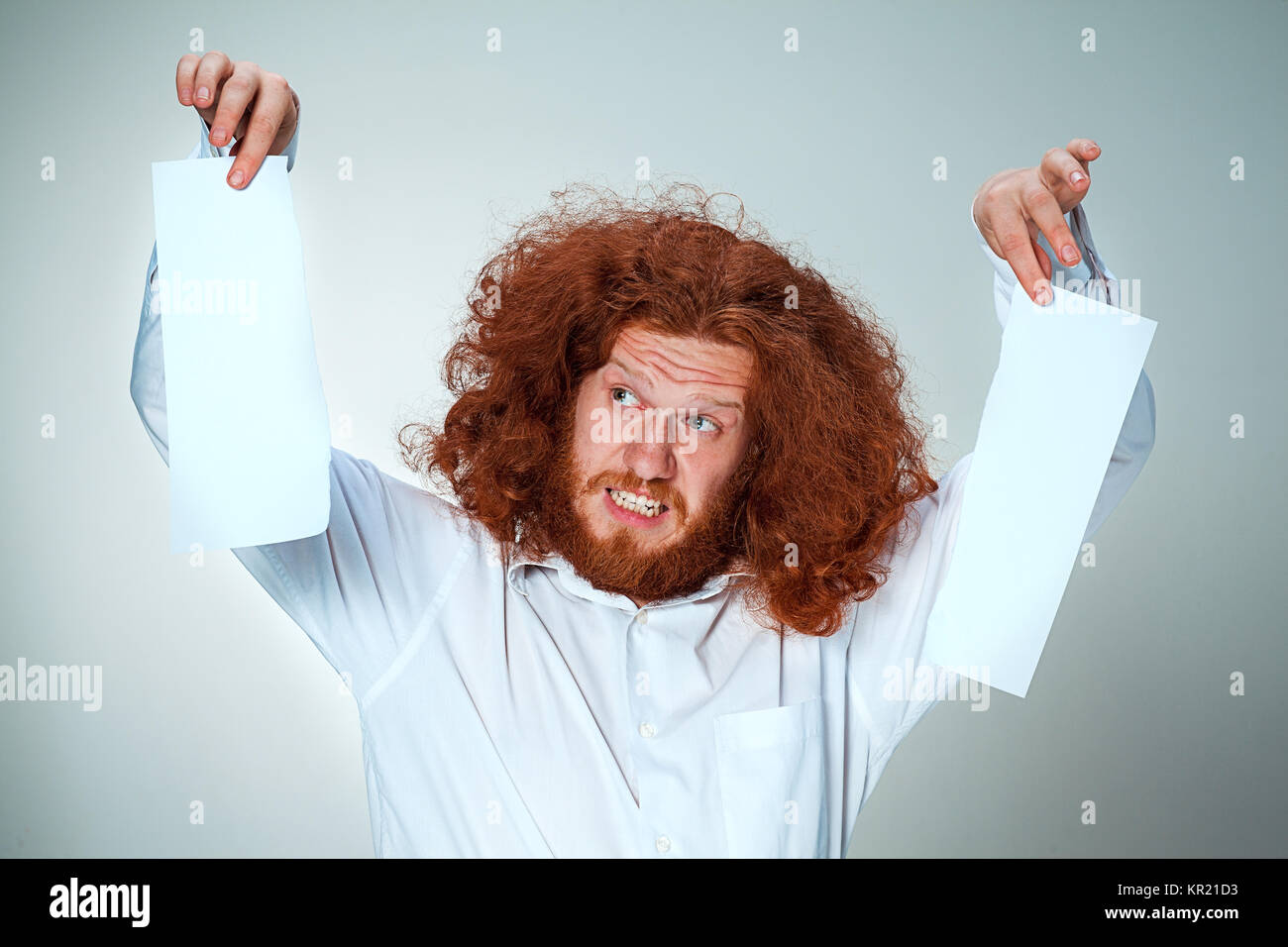Angry man tear out paper hi-res stock photography and images - Alamy
