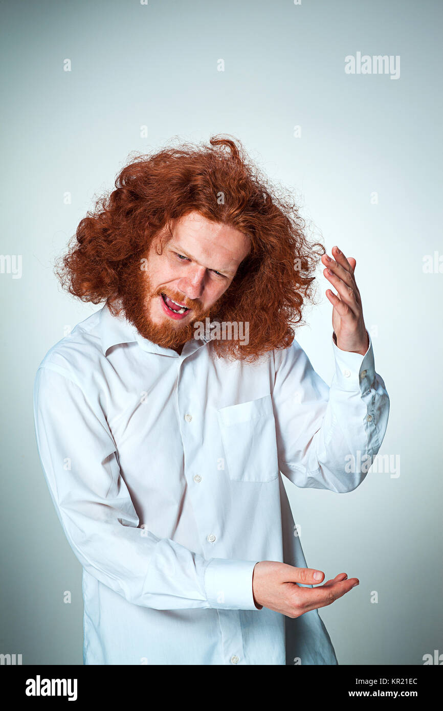 The young vexed man Stock Photo - Alamy