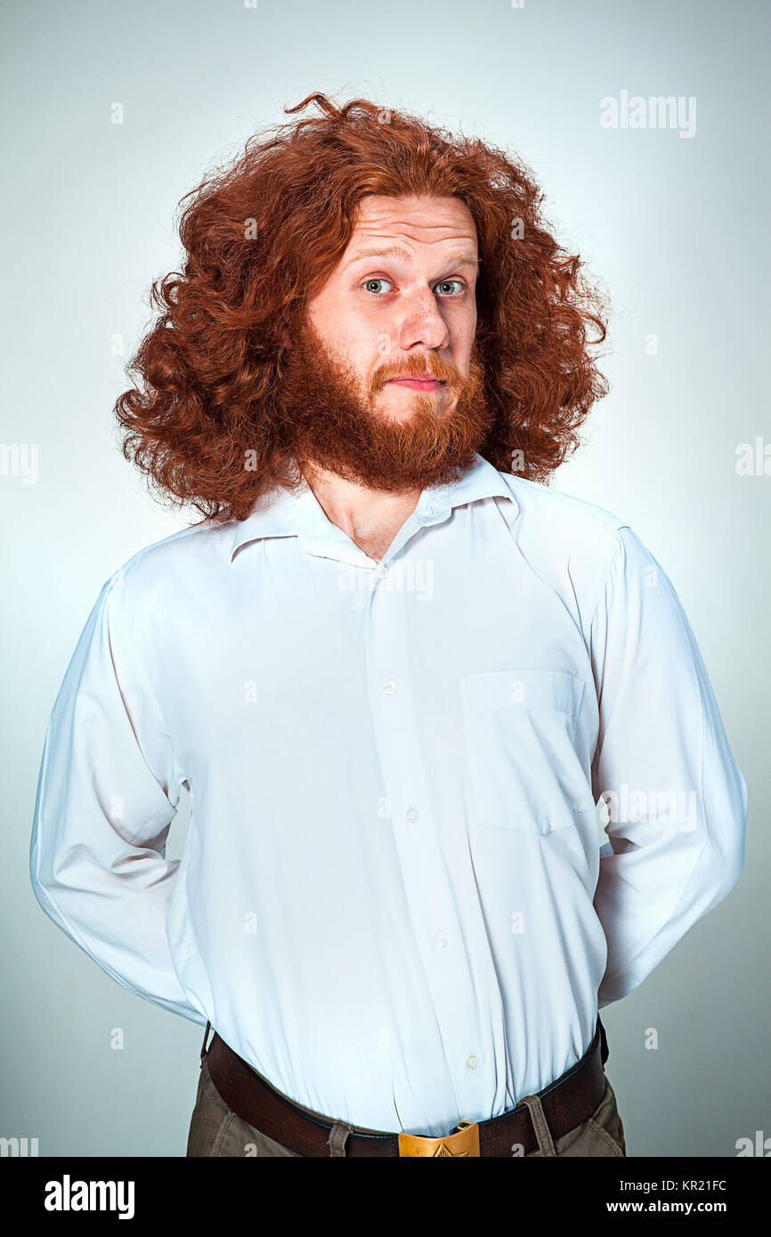 Portrait of young man with shocked facial expression Stock Photo - Alamy