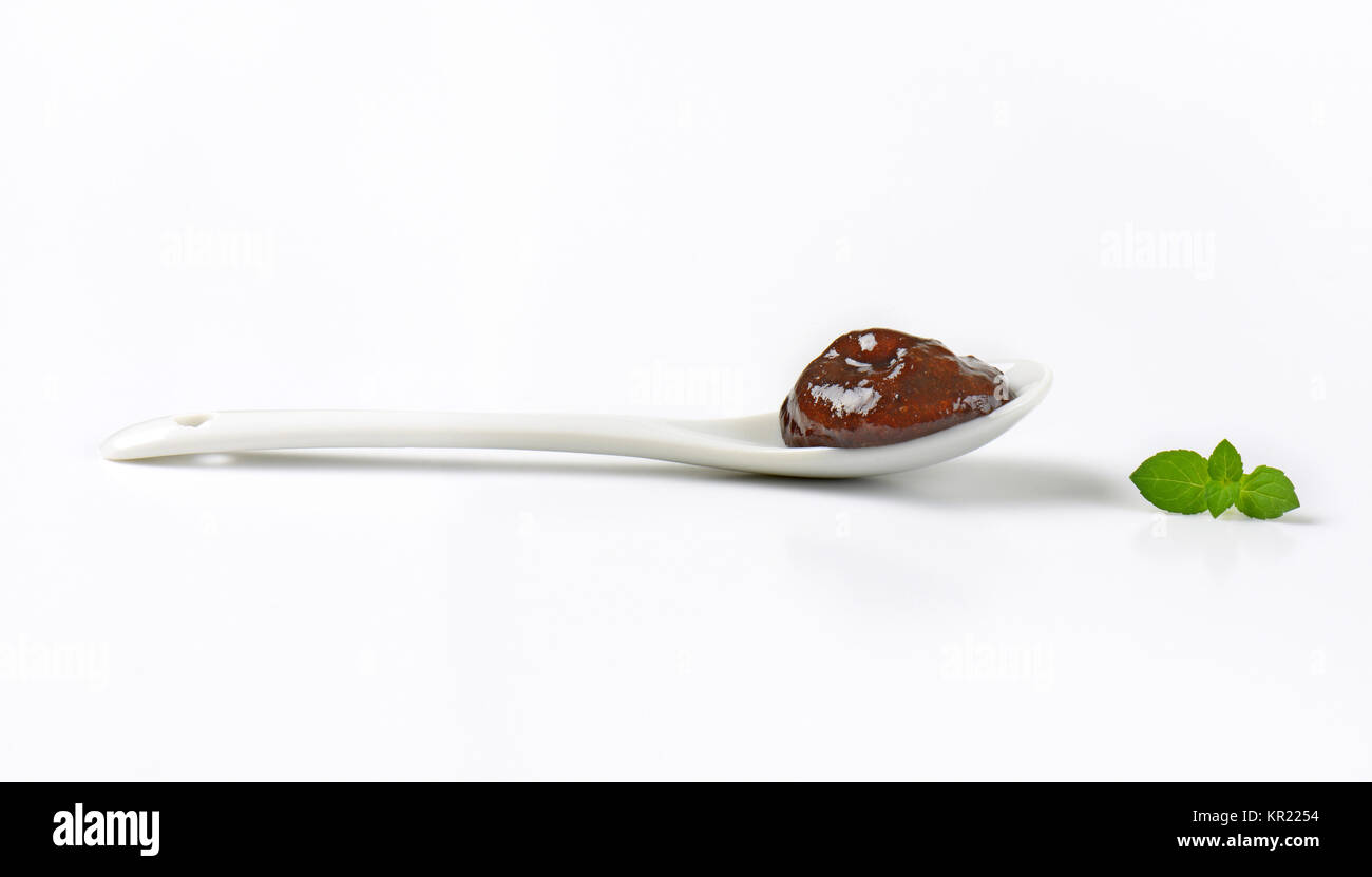 spoon of plum jam Stock Photo - Alamy