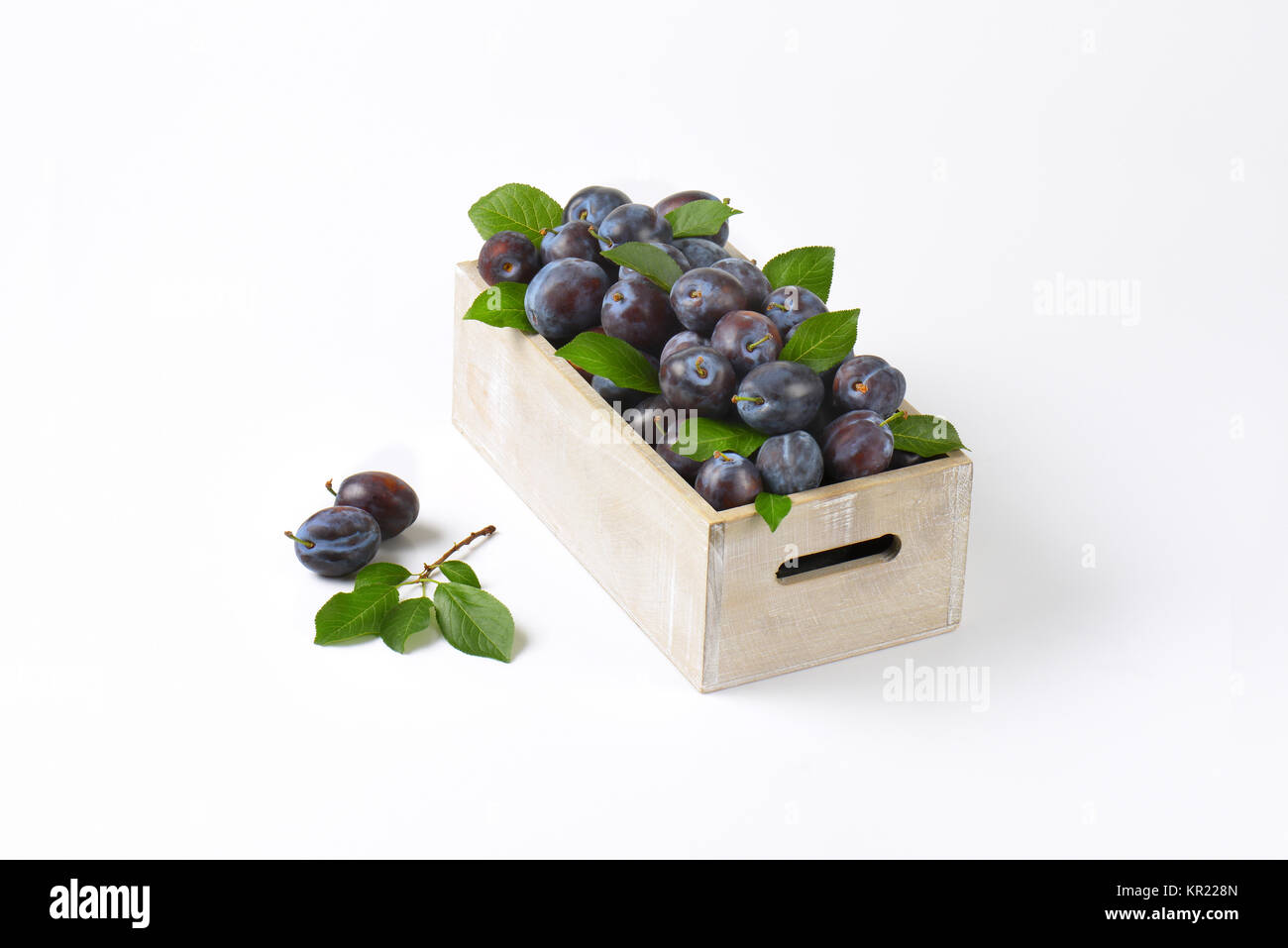 box of plums Stock Photo - Alamy