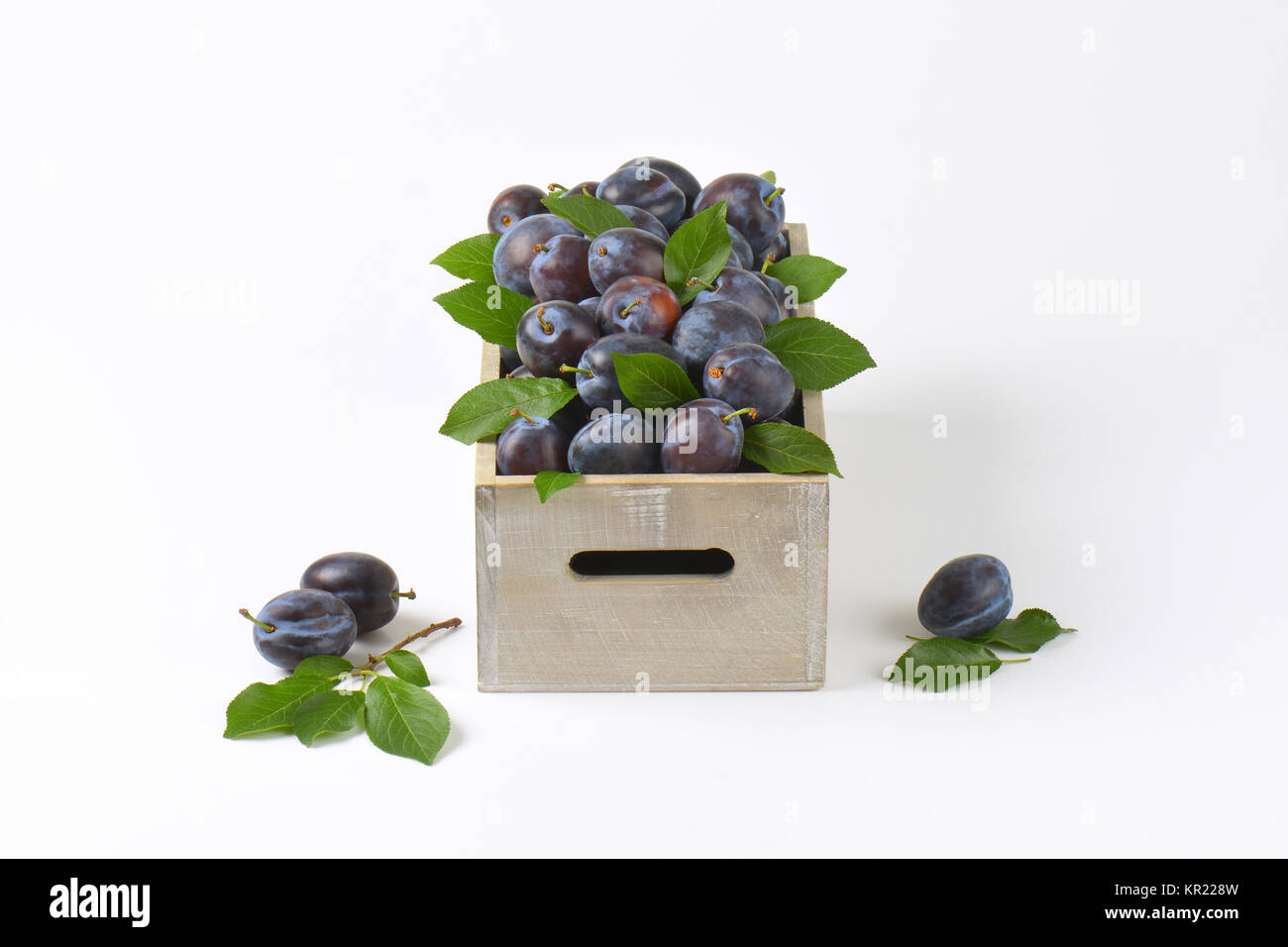 box of plums Stock Photo - Alamy