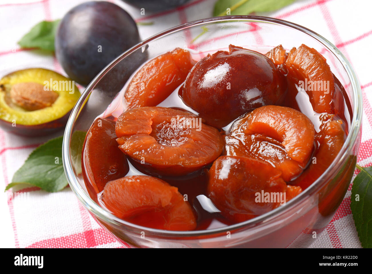 Bowl of plum compote Stock Photo - Alamy