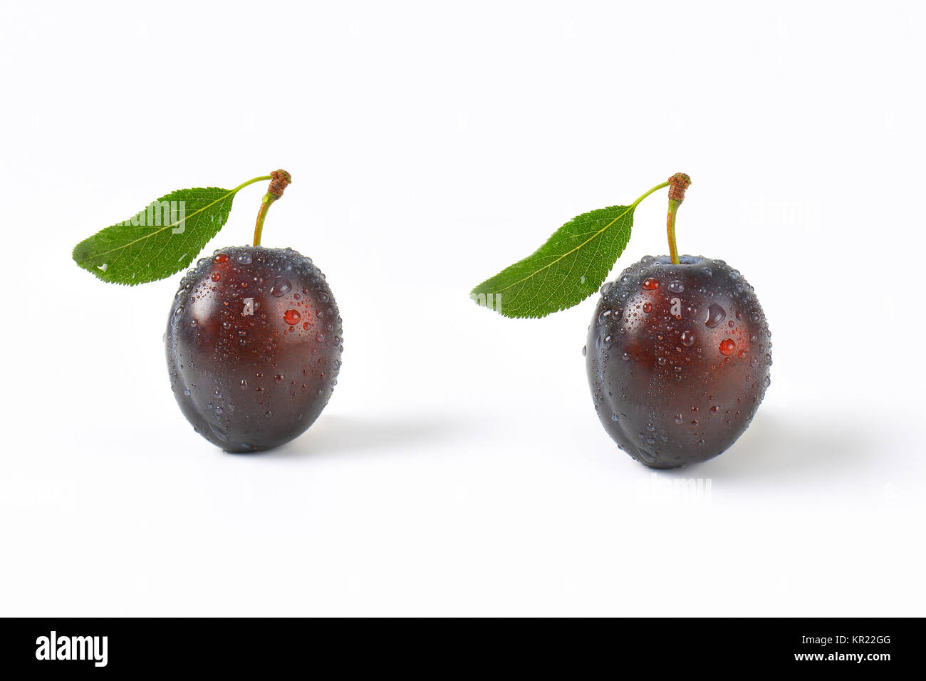 two wet plums Stock Photo - Alamy