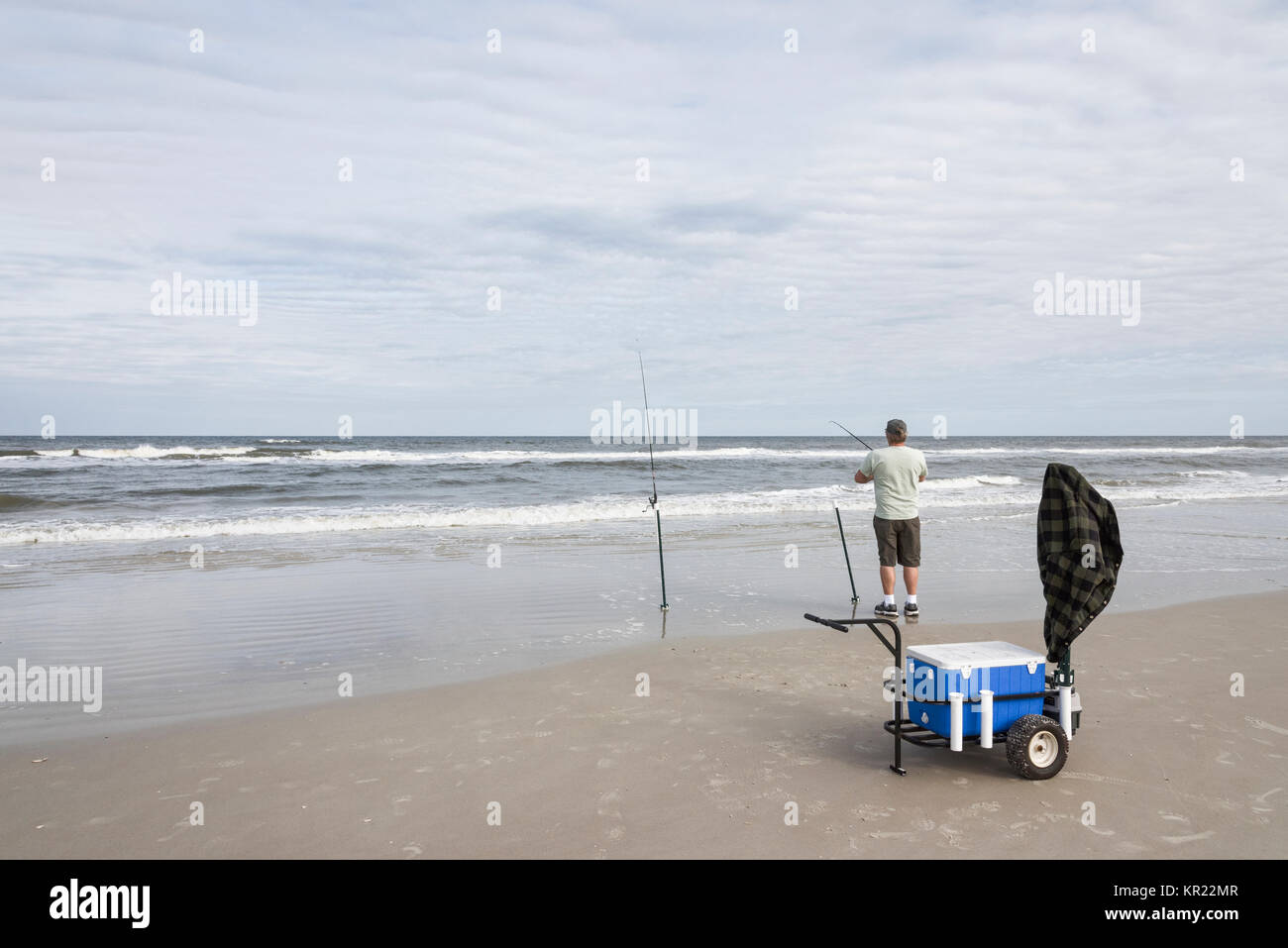 Man Fishing on a Florida Ocean Beach Shoreline United States Stock ...