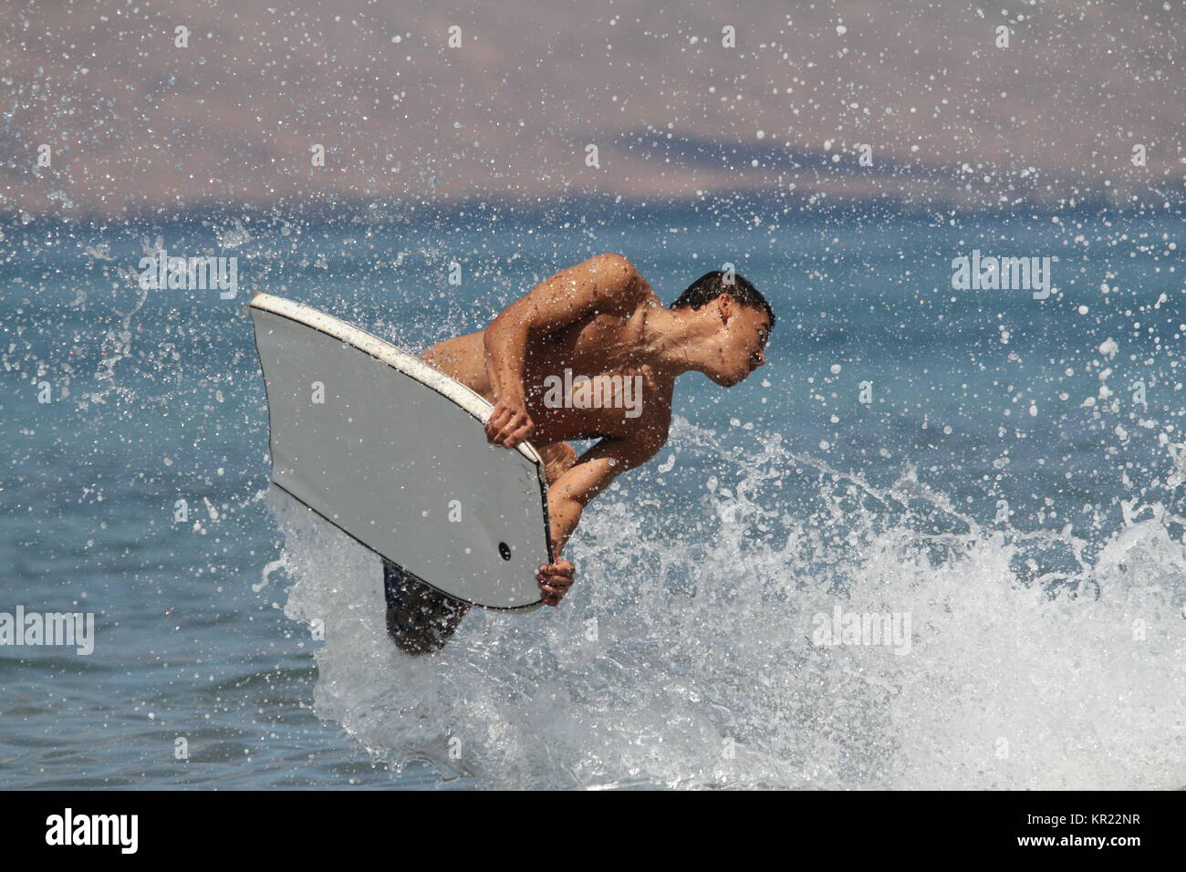 body boarding at Waikiki Stock Photo - Alamy
