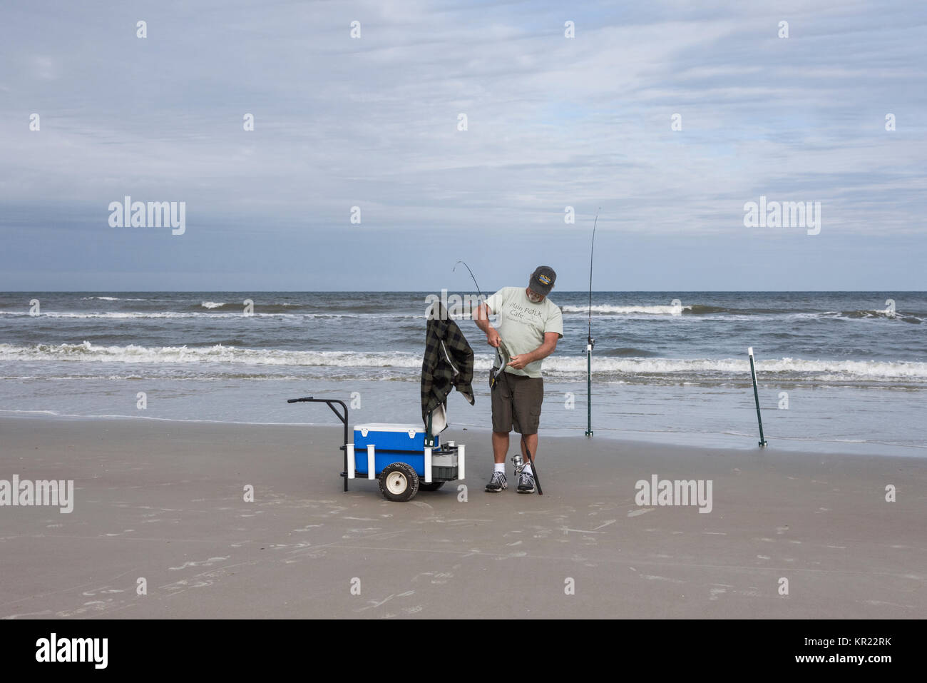 Man Fishing on a Florida Ocean Beach Shoreline United States Stock ...