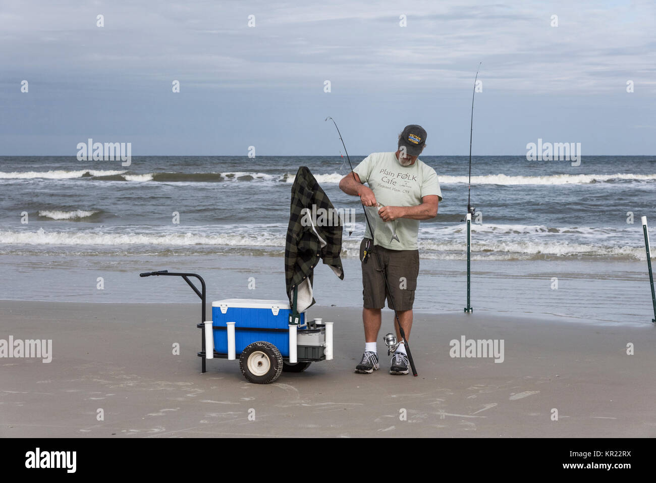 Man Fishing on a Florida Ocean Beach Shoreline United States Stock ...