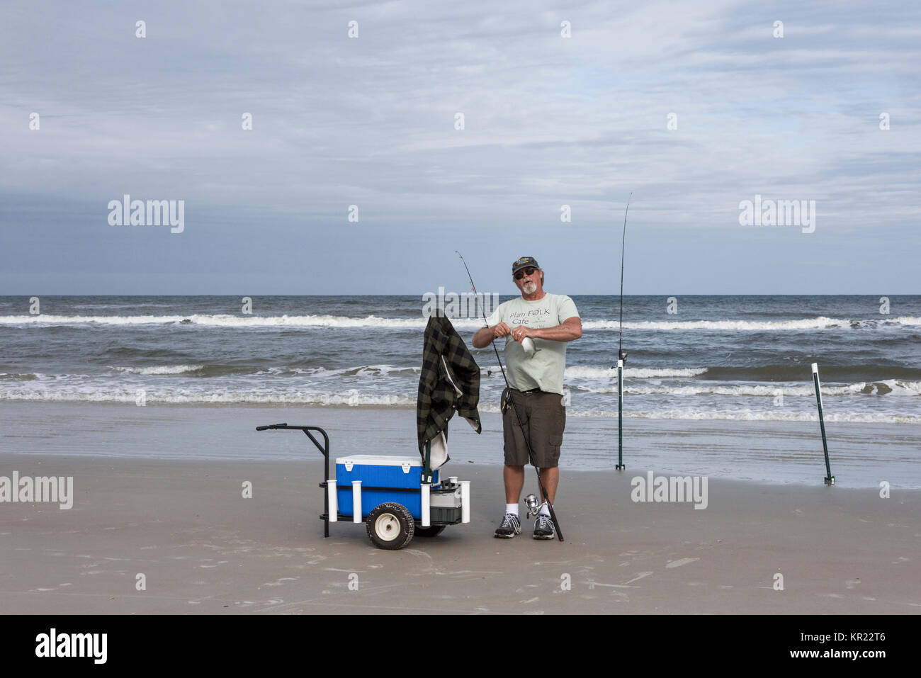 Man Fishing on a Florida Ocean Beach Shoreline United States Stock ...