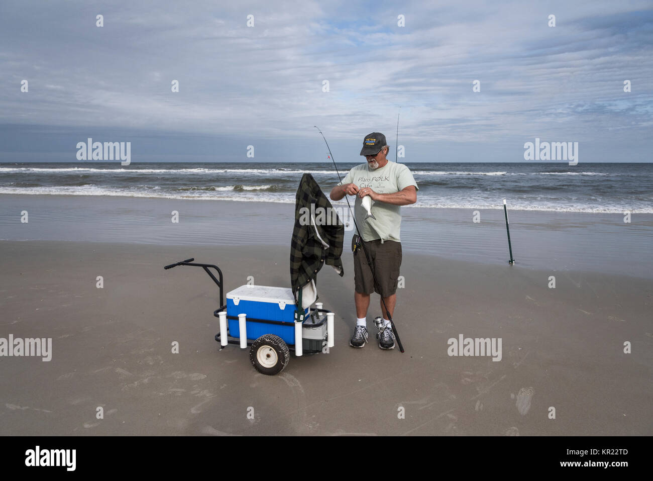 Man Fishing on a Florida Ocean Beach Shoreline United States Stock ...