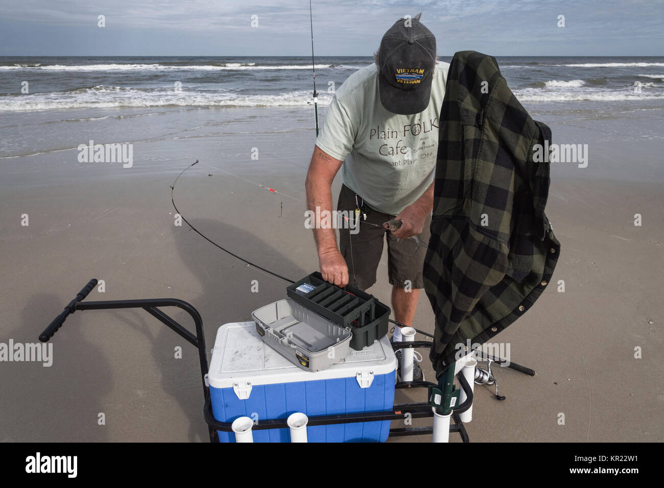 Man Fishing on a Florida Ocean Beach Shoreline United States Stock ...