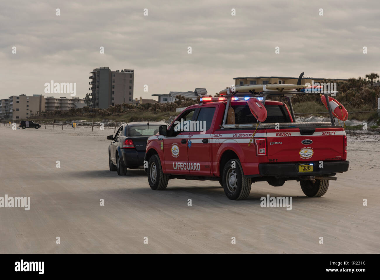 Traffic stop on the Florida Beach vehicle Access lane Stock Photo - Alamy