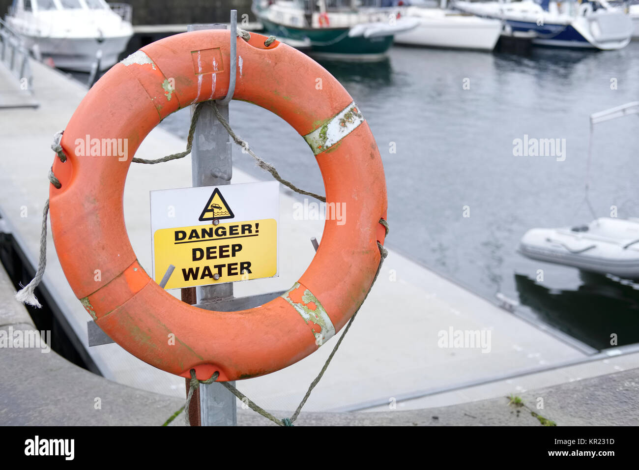 Danger Deep Water Sign Orange Life Safety Ring at Marina Dangerous ...