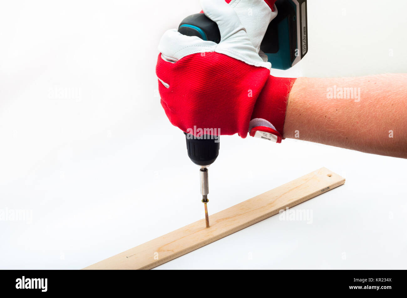 Screwing witn electrical screwdriver Stock Photo - Alamy