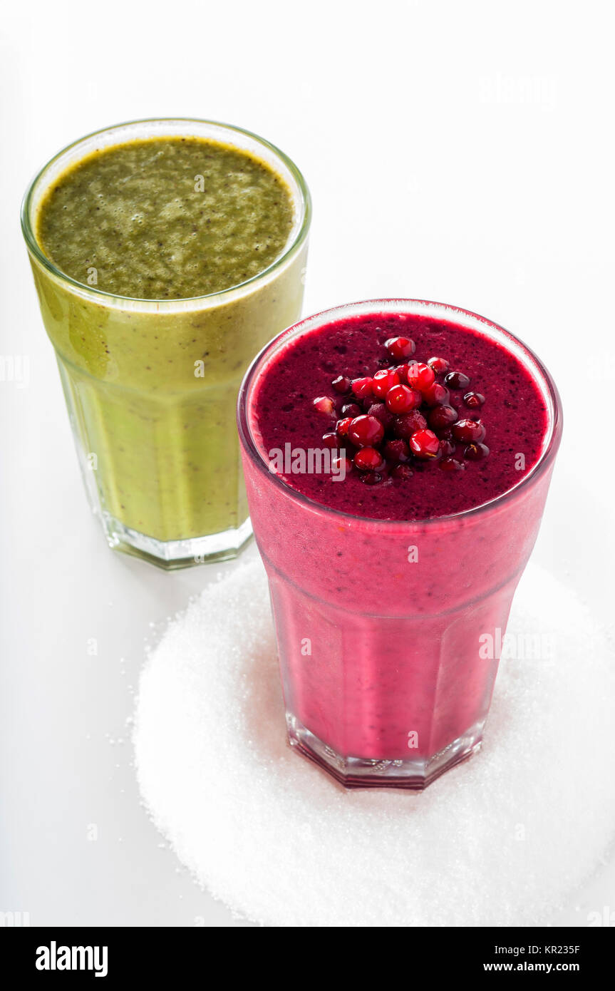 Health concept - healthy vs. unhealthy smoothie smoothie with sugar ...