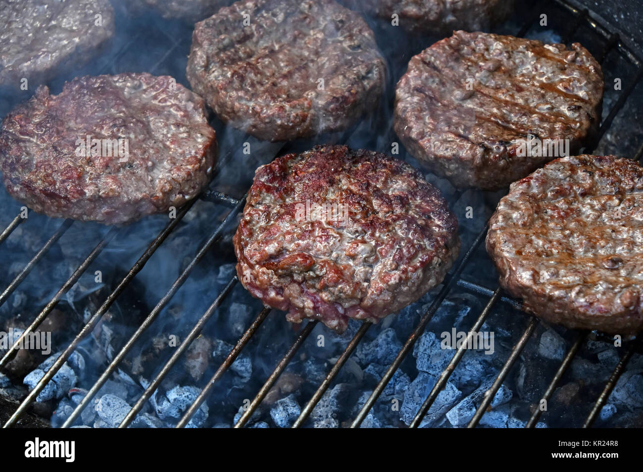 Meat burgers for hamburger grilled on grill Stock Photo - Alamy